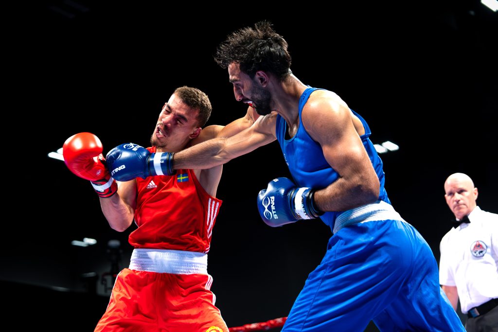 Six men reach semi-final stages following victories on day two of World ...